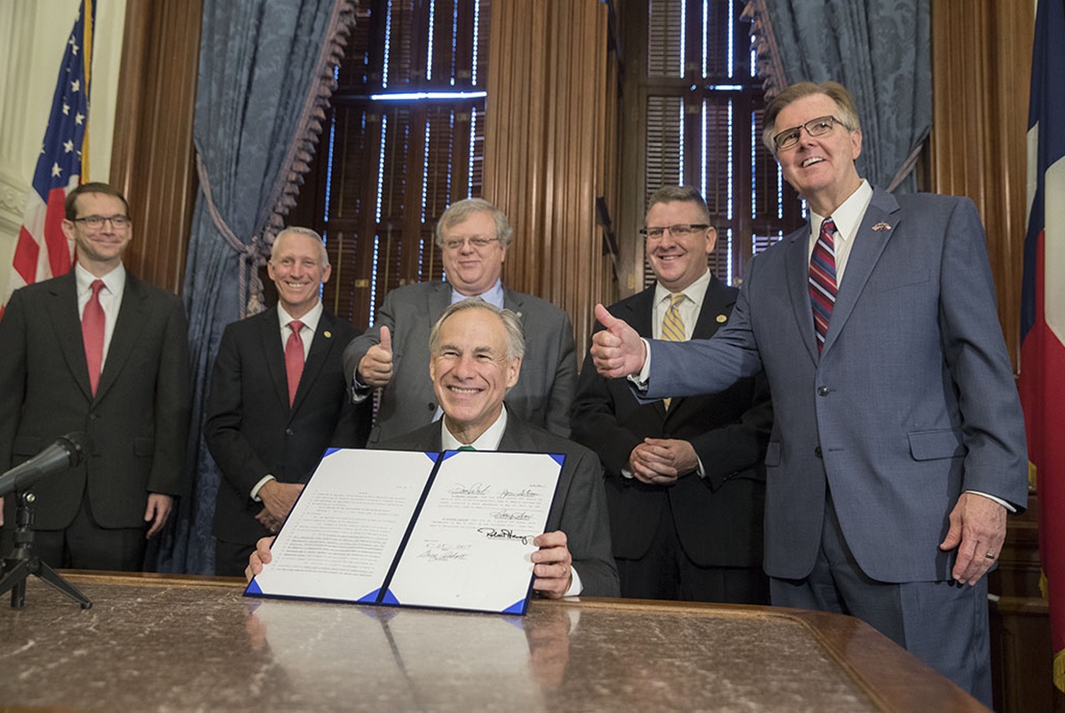 Abbott signs crackdown on inappropriate student-teacher relationships ...