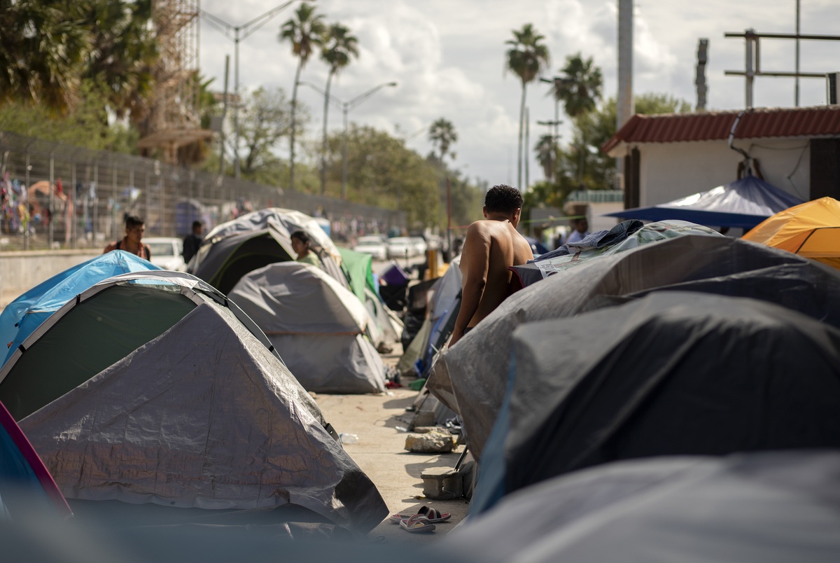 Conditions deteriorating at migrant camp where thousands await U.S ...
